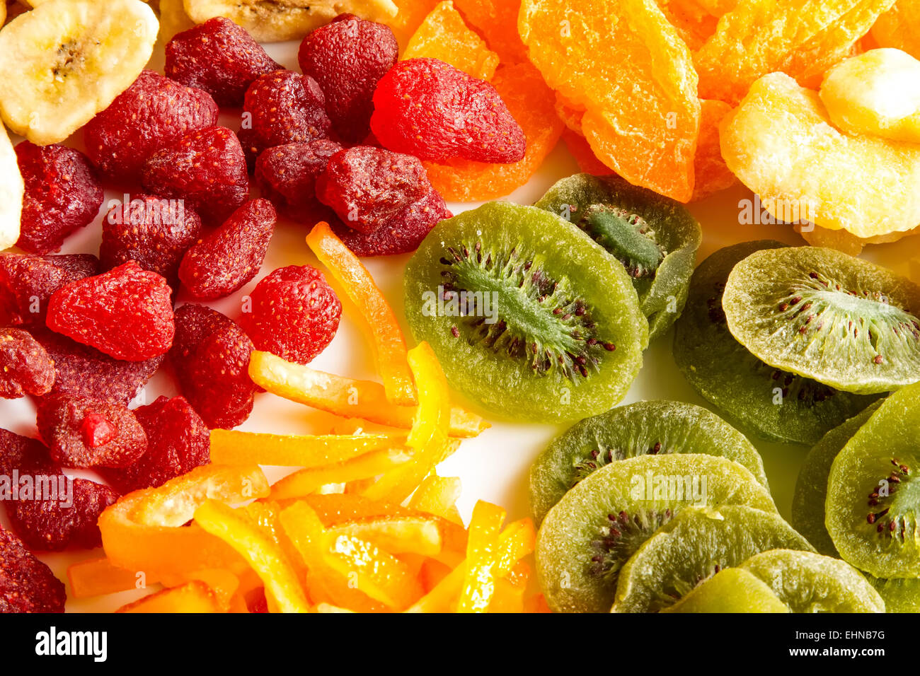 Selection of colorful dried fruits background Stock Photo - Alamy