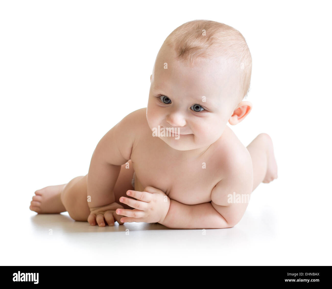 lying smiling baby boy isolated on white background Stock Photo - Alamy