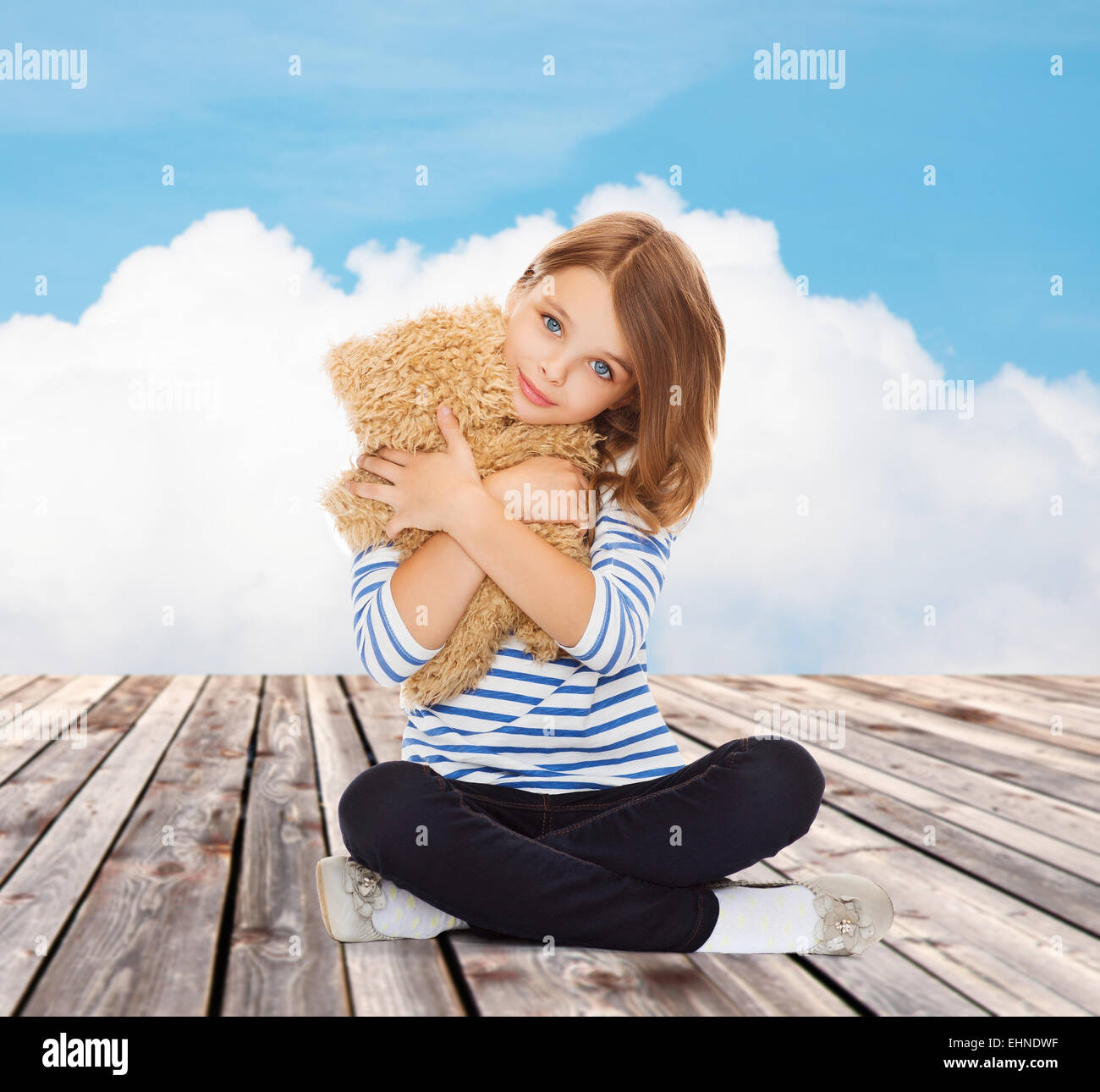 cute little girl hugging teddy bear Stock Photo - Alamy