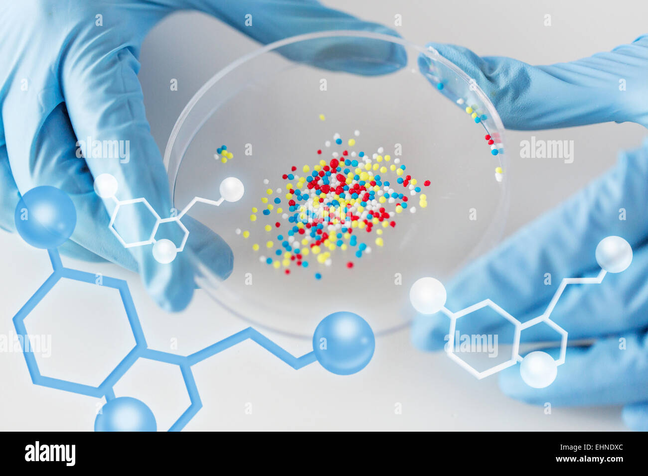 close up of scientist hands holding chemical cure Stock Photo - Alamy