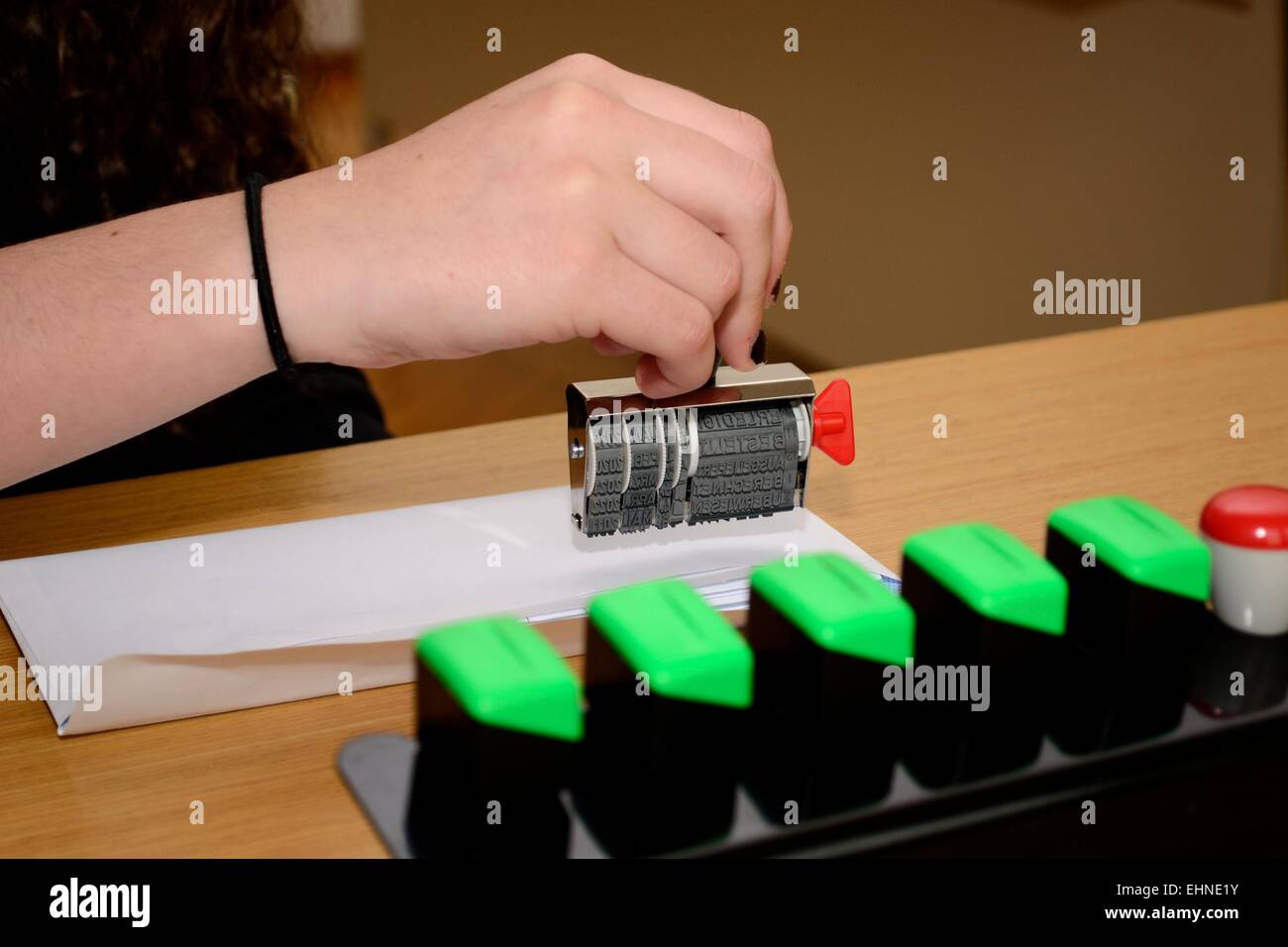 hand with office stamp Stock Photo - Alamy