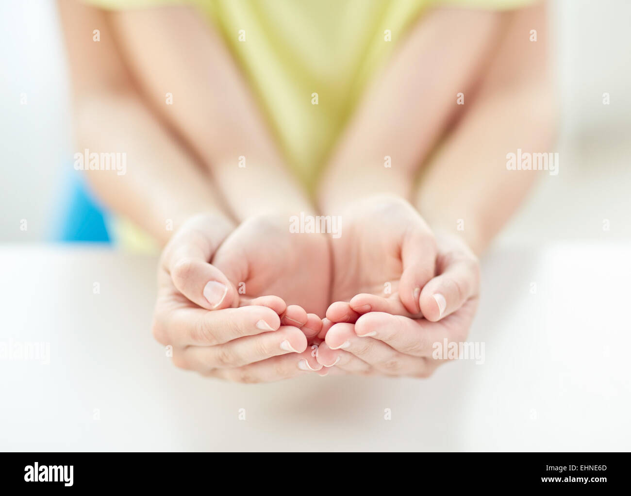 Hands cupped together hi-res stock photography and images - Alamy