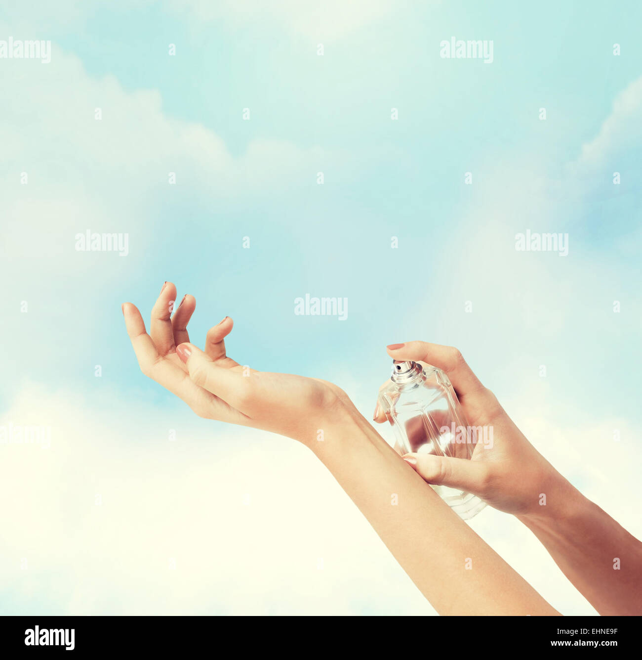 woman hands spraying perfume Stock Photo - Alamy