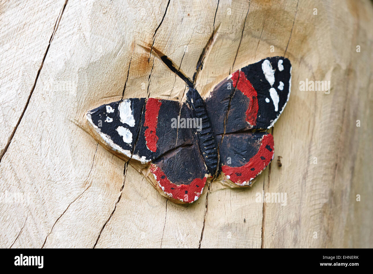 Carved and painted wooden butterfly Stock Photo - Alamy