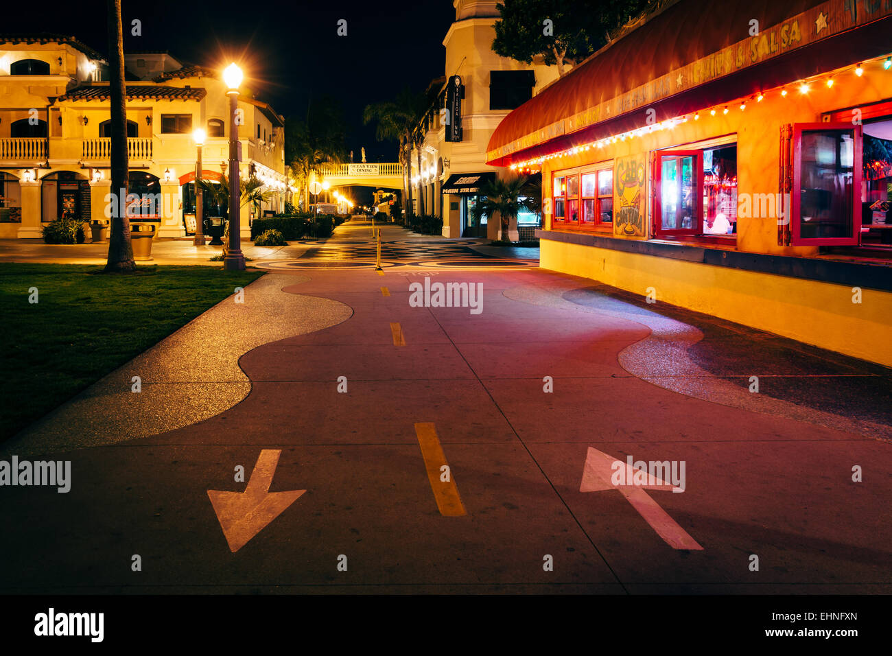 Buildings along the Oceanfront Boardwalk at night, in Newport Beach ...