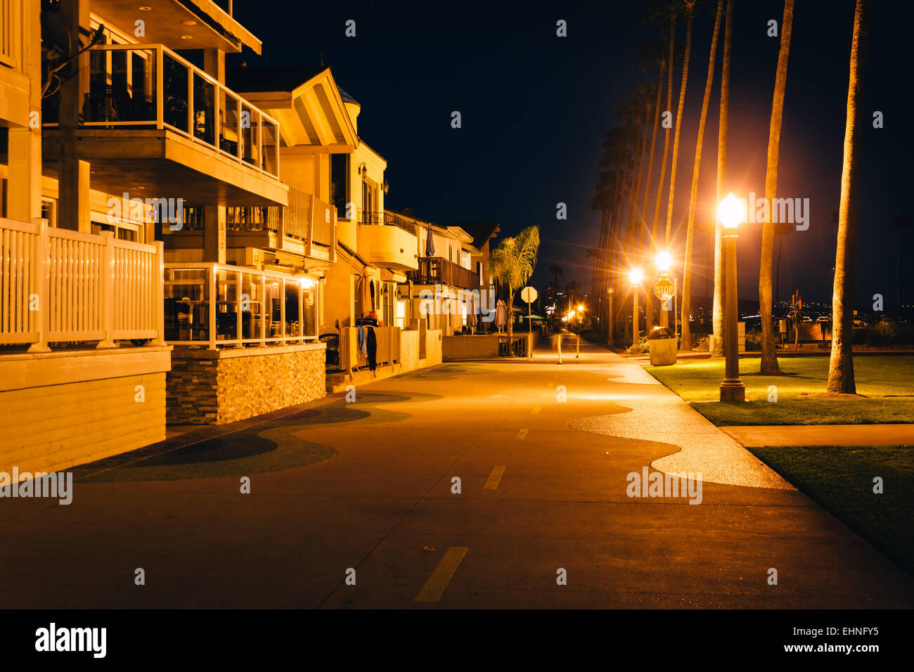 Buildings along the Oceanfront Boardwalk at night, in Newport Beach ...