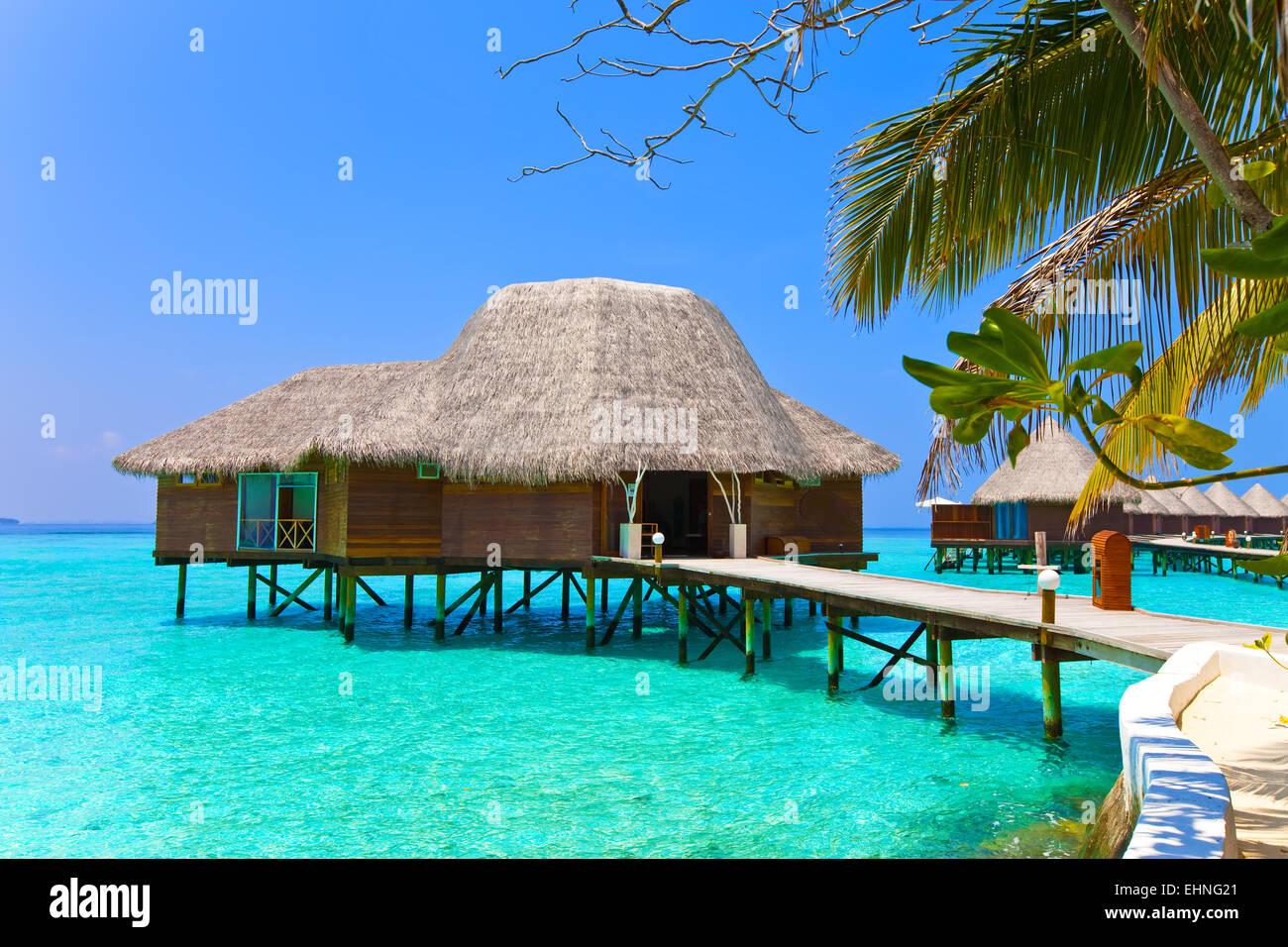 Island in ocean, overwater villa Stock Photo - Alamy