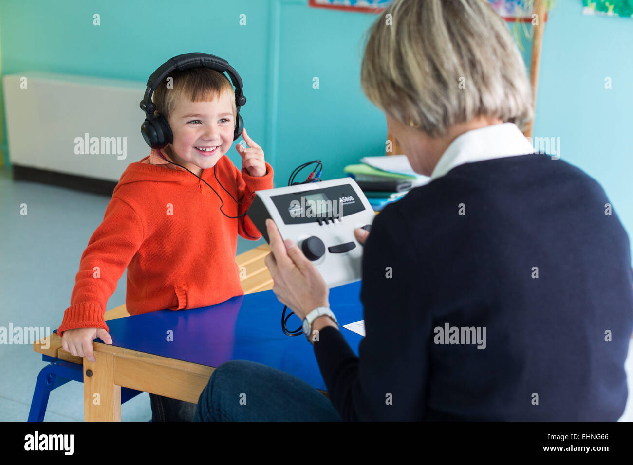 Medical check up performed pediatric nurse hi-res stock photography and ...