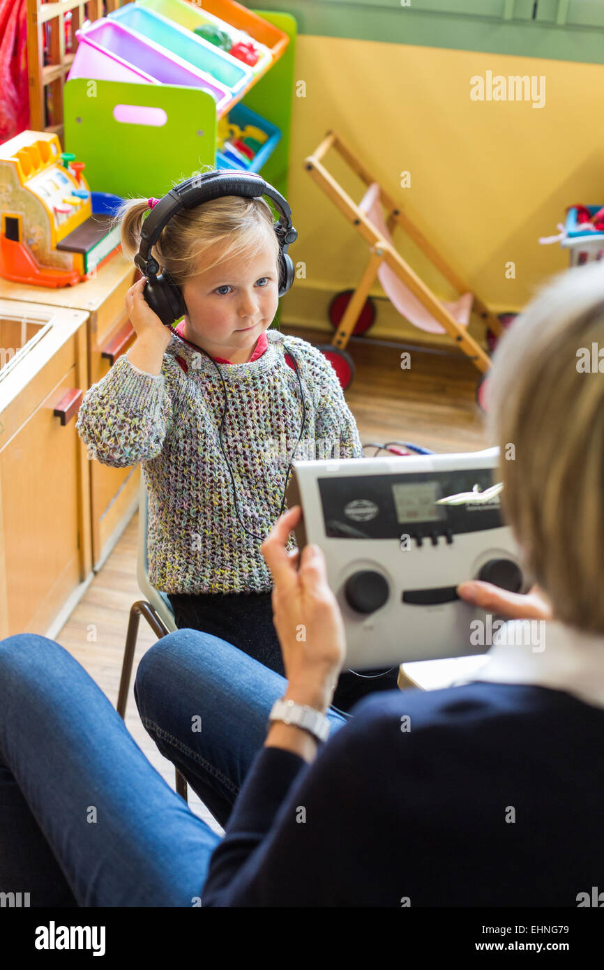 Medical check up performed pediatric nurse hi-res stock photography and ...