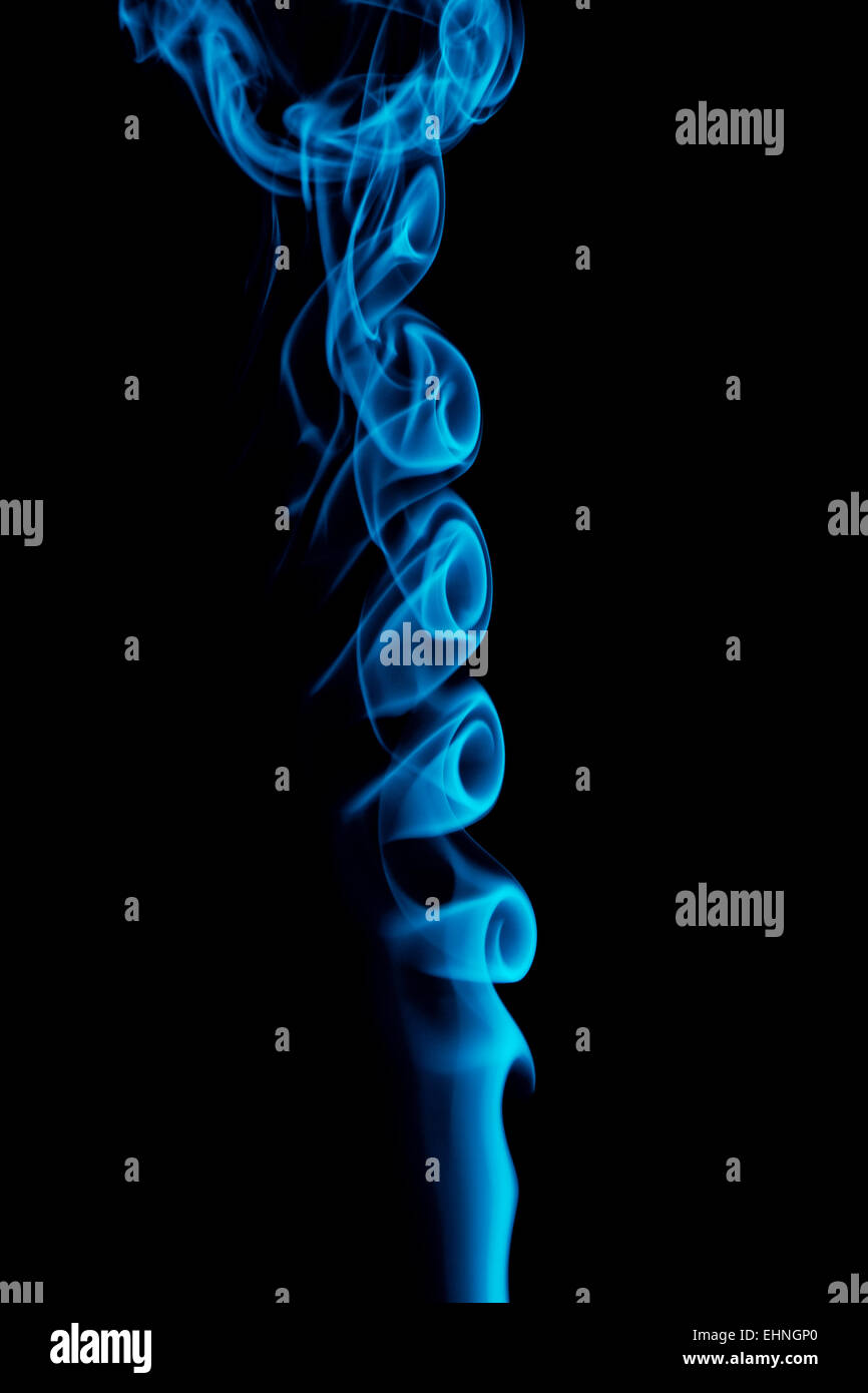 cyan smoke in black background Stock Photo - Alamy