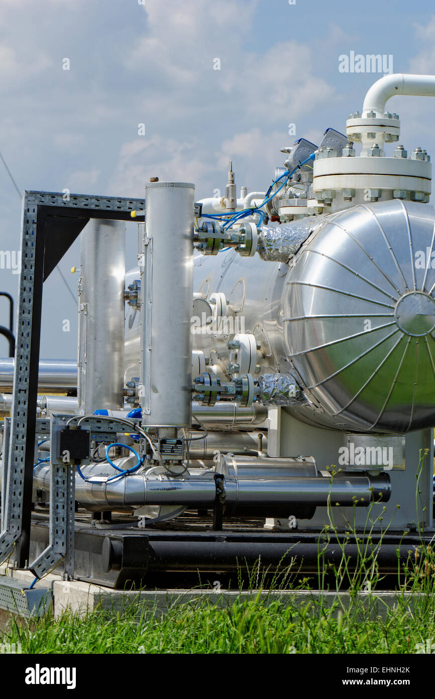 industrial pipes at an oil well Stock Photo - Alamy