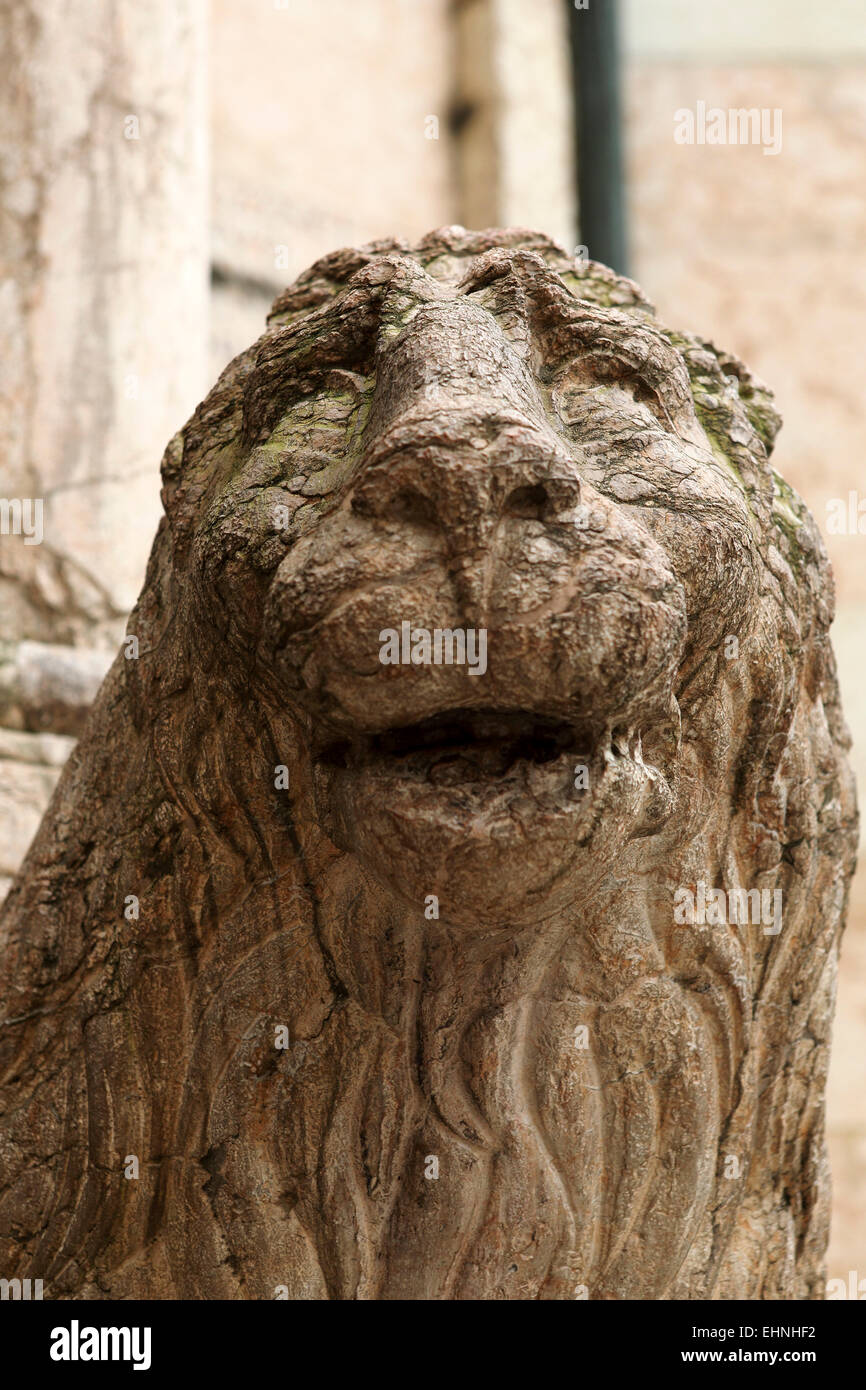 A medieval stone lion sculpture outside the baptistry of Cremona ...