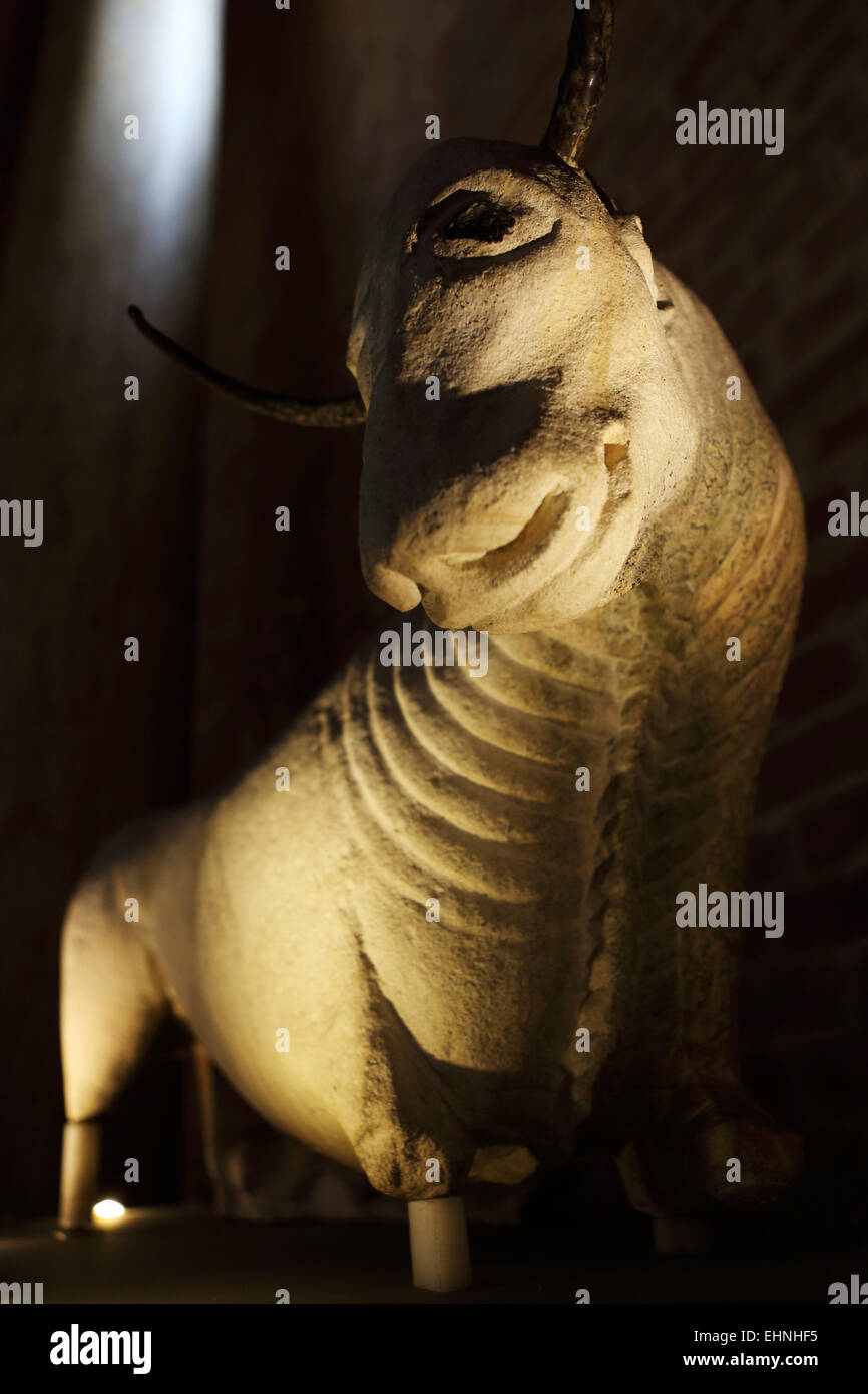 A medieval stone bull sculpture in the Baptistery of Cremona Cathedral ...
