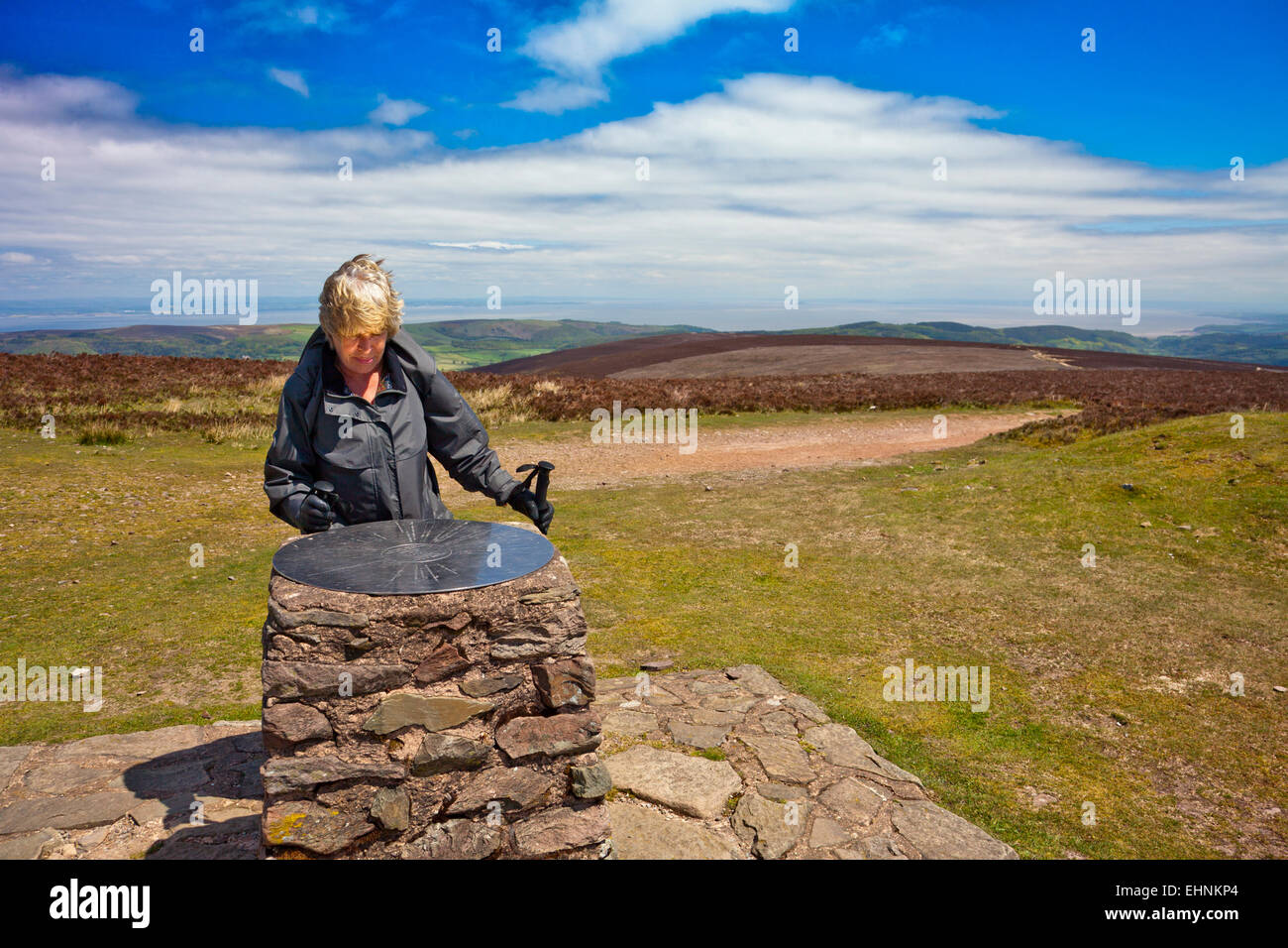 A walker using the topograph on Dunkery Beacon summit - 1,705ft - the ...