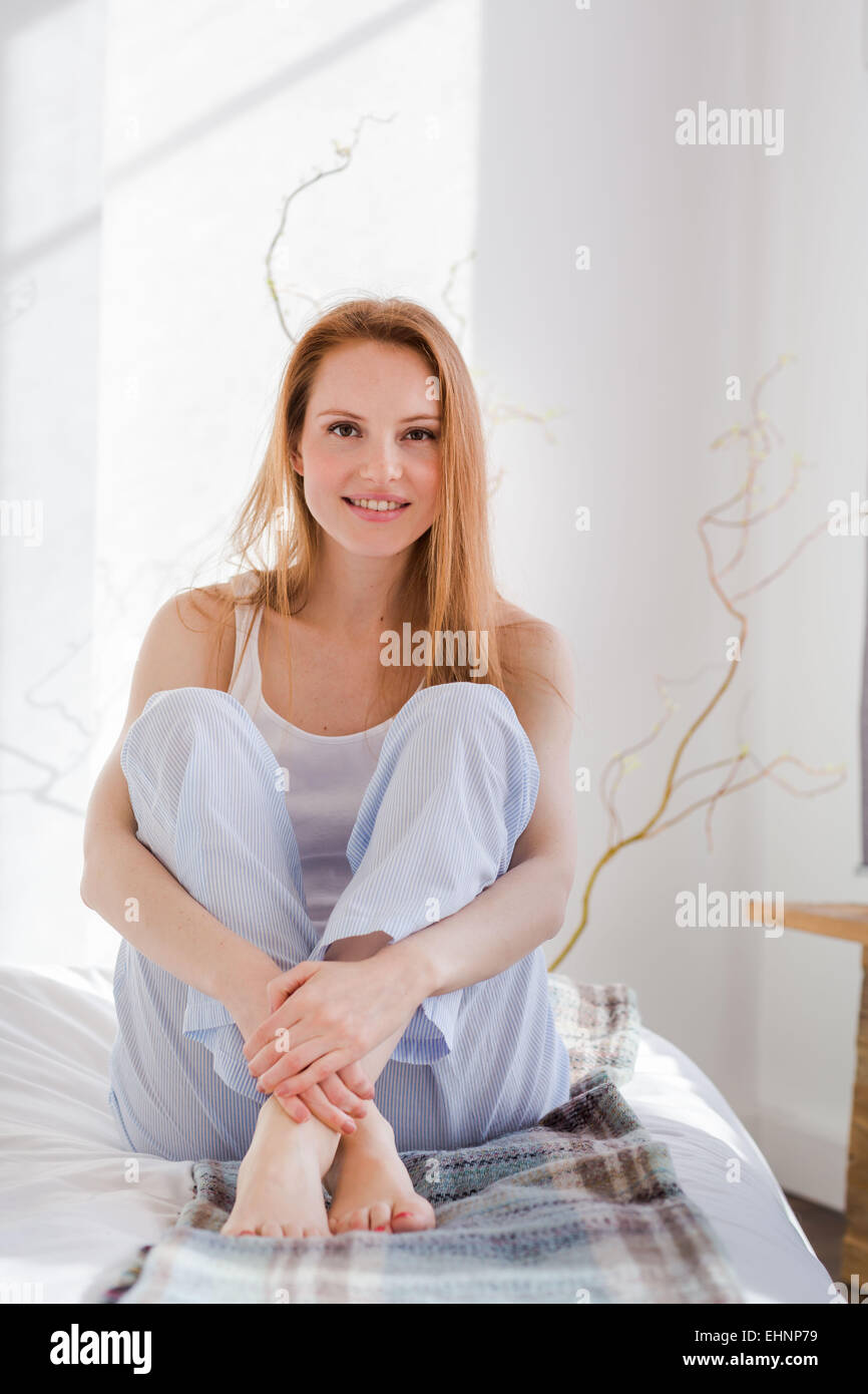 Woman resting bed Stock Photo - Alamy