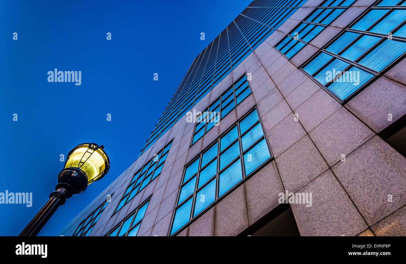 Looking up at a streetlight and the PNC Bank Center building in ...