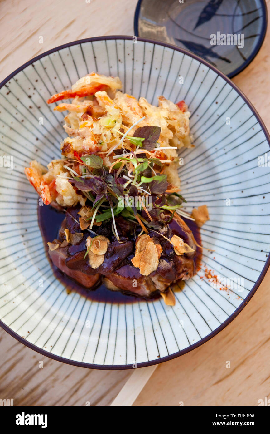 Japanese dish with beef, meat sauce and tempura of vegetables Stock ...
