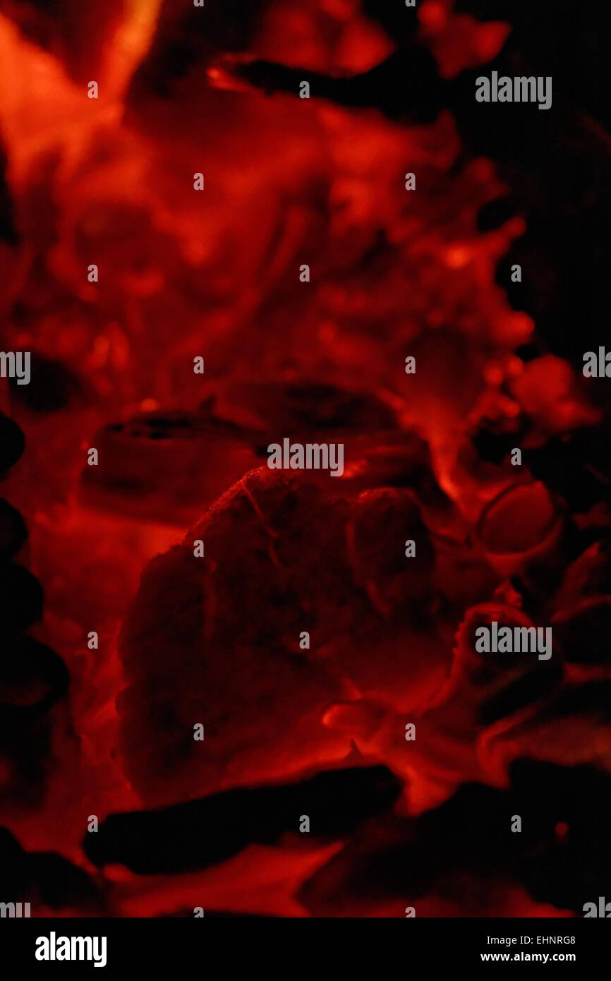 glowing embers in hot red color Stock Photo - Alamy