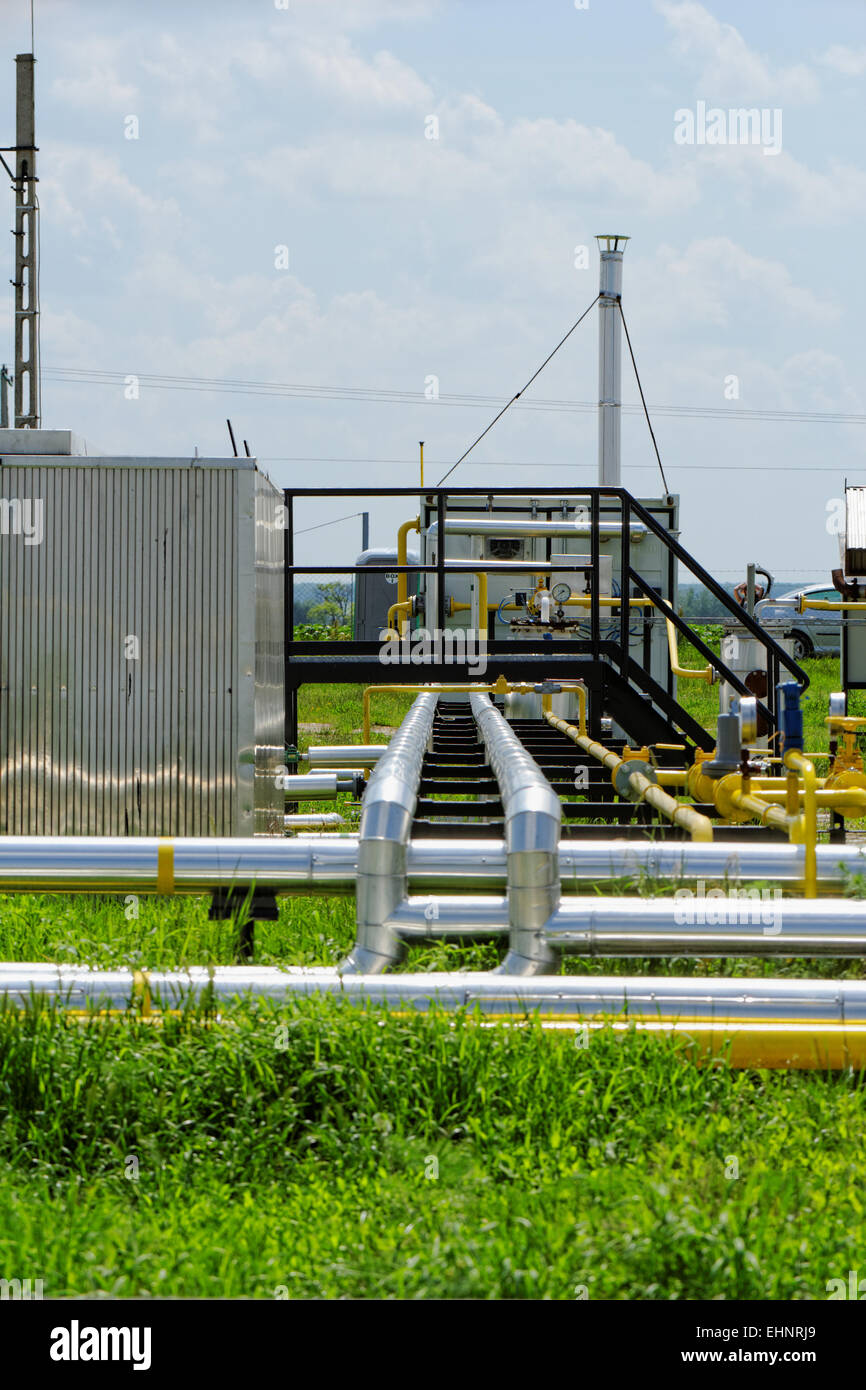 industrial pipes at an oil well Stock Photo - Alamy