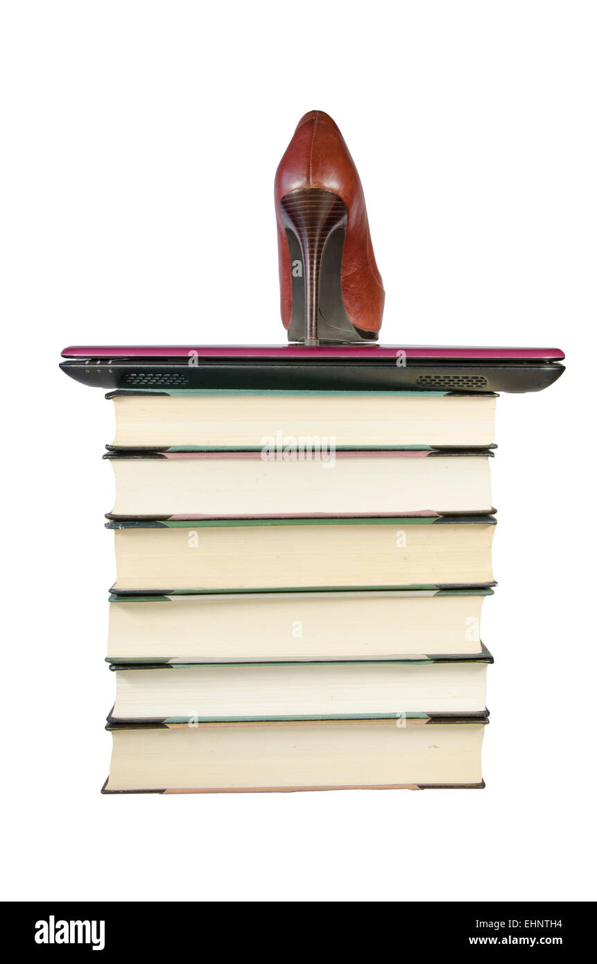 Reading laptop and book Cut Out Stock Images & Pictures - Alamy