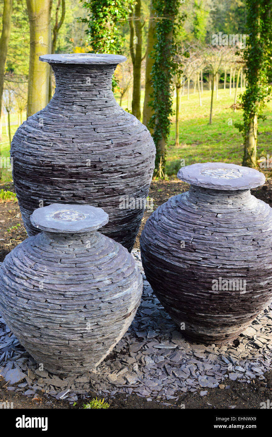 Slate pot sculptures in Alnwick Garden, Northumberland Stock Photo - Alamy