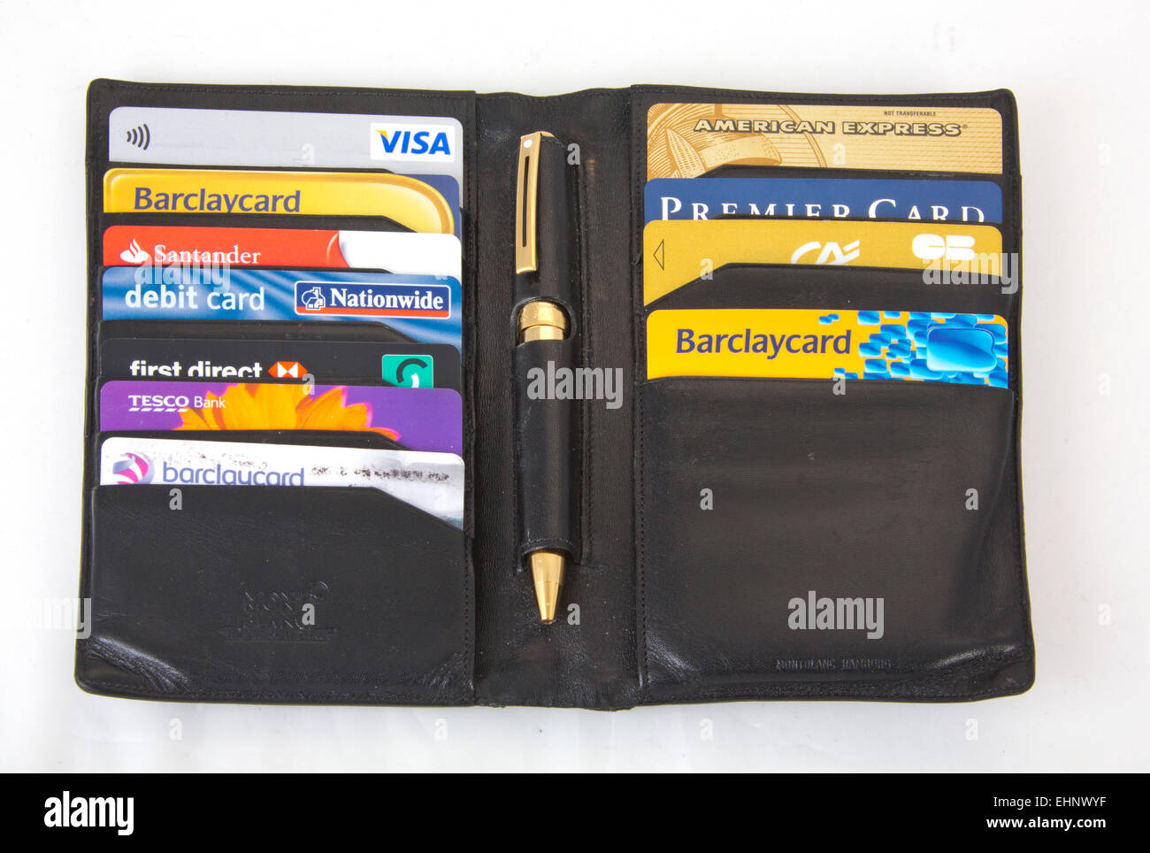 Black wallet with Assortment of credit cards Visa and American express ...