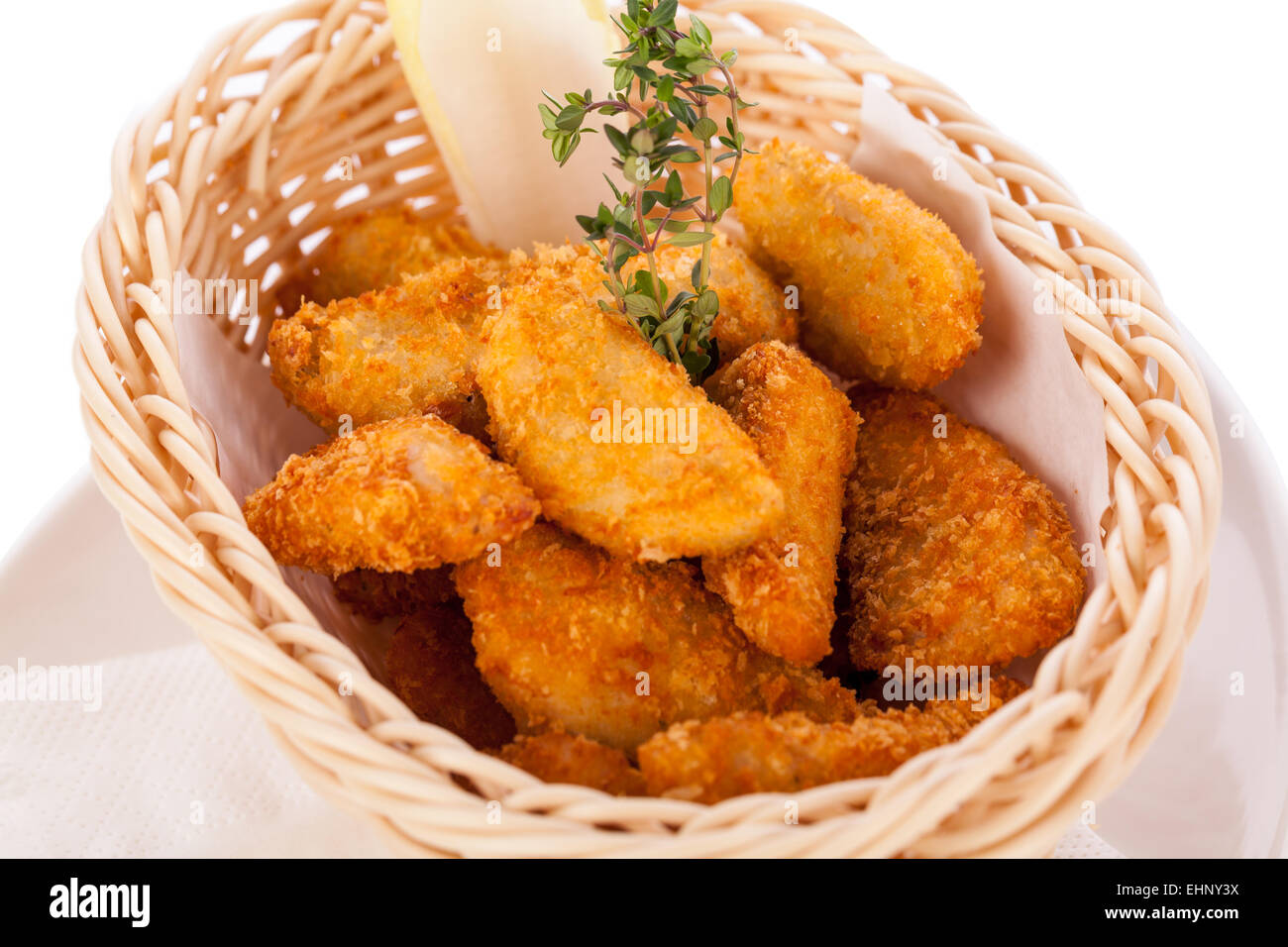 Crisp crunchy golden chicken legs and wings deep fried in bread crumbs ...