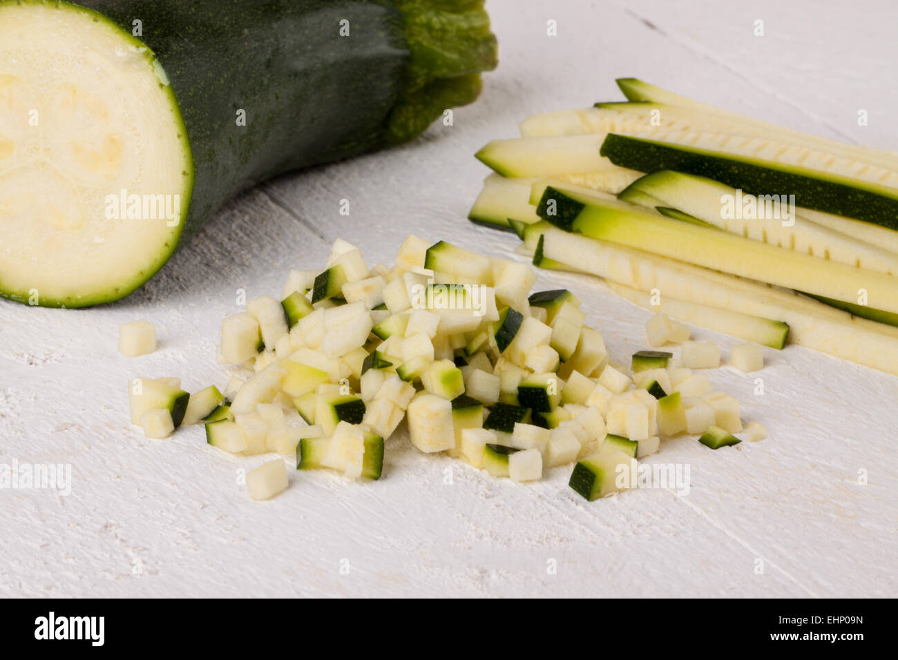 Fresh marrow or courgette cut into batons and diced into small cubes ...