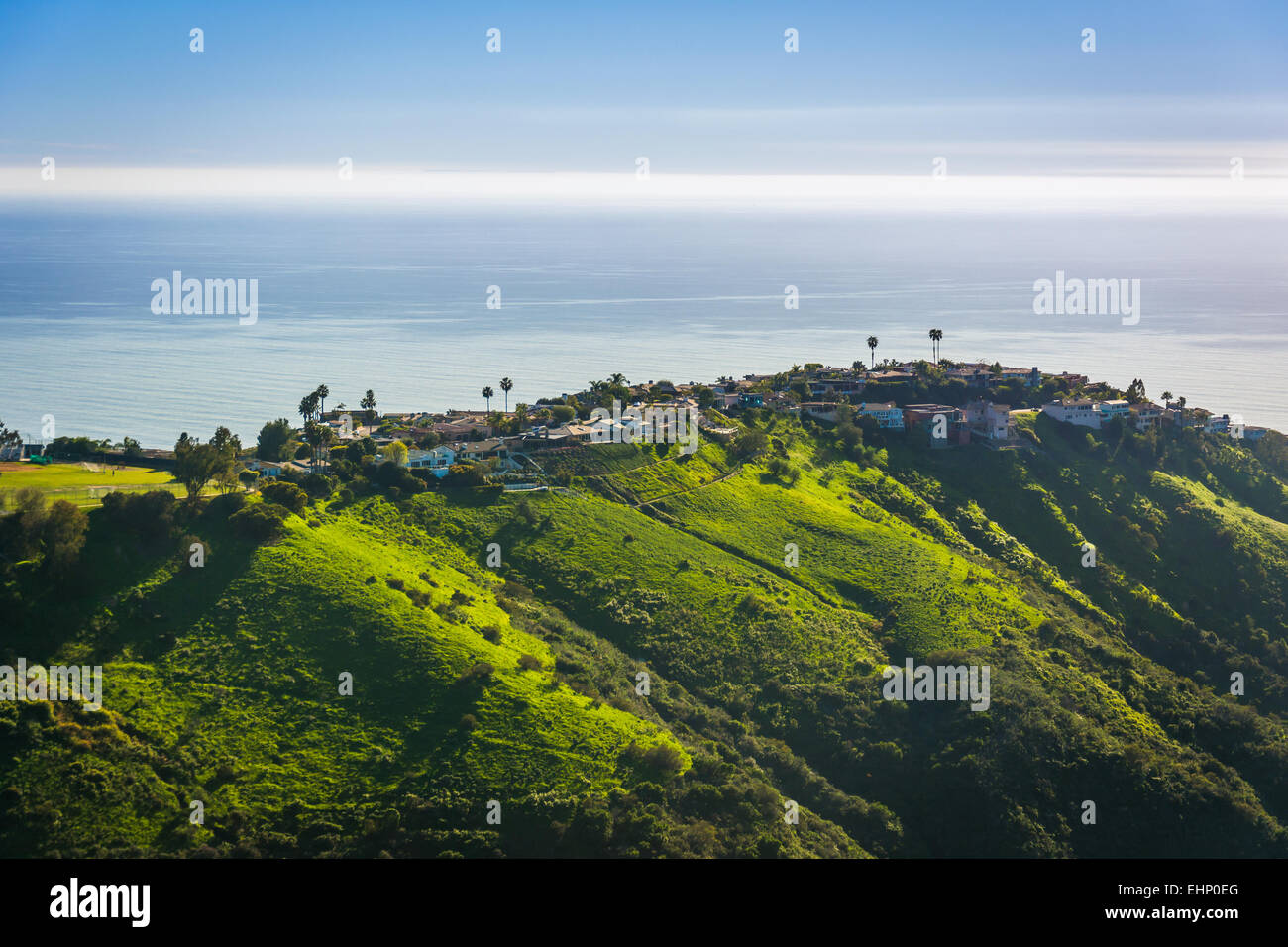 View of green hills and houses overlooking the Pacific Ocean, in Laguna ...