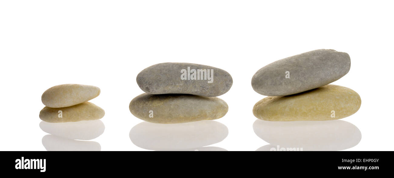 Stones stacked isolated with reflection Stock Photo - Alamy