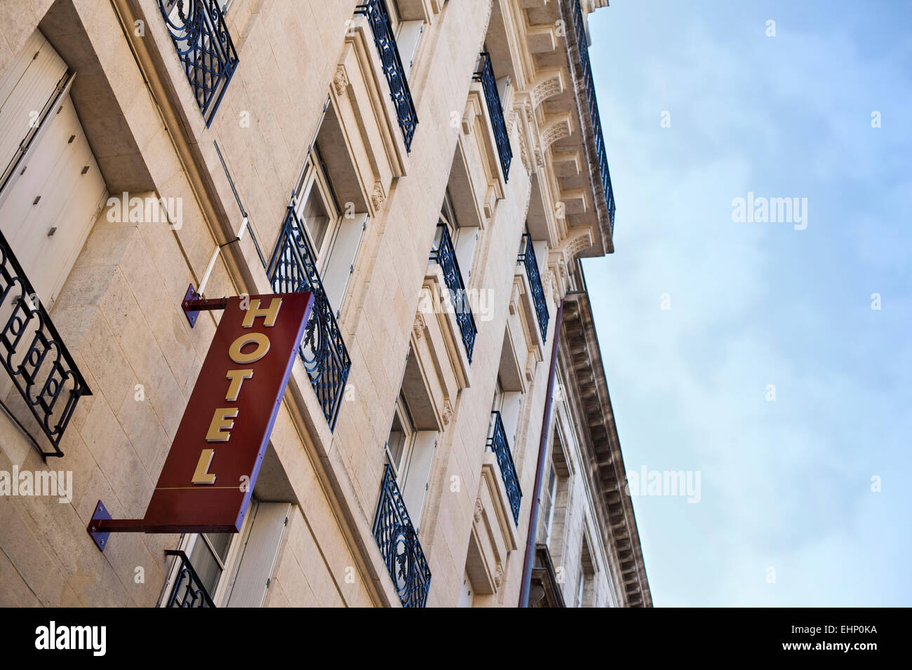 Hotel sign and facade in a French town Stock Photo - Alamy