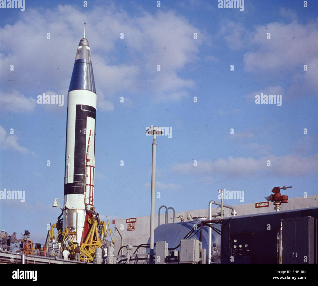Photograph of the Atlas 12A missile on the pad, capturing a critical ...