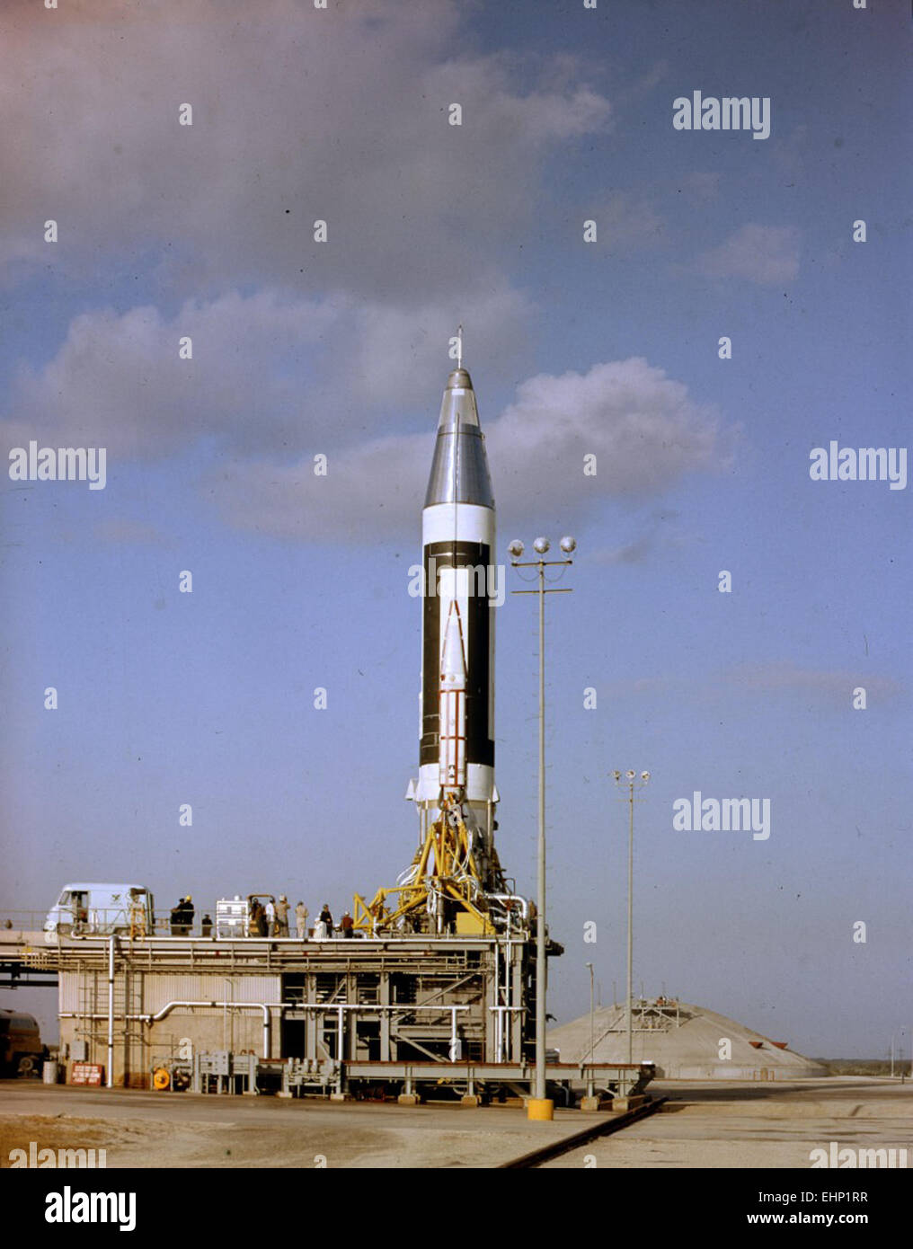 This image shows the Atlas 12A rocket on its launch pad, with the Tower ...