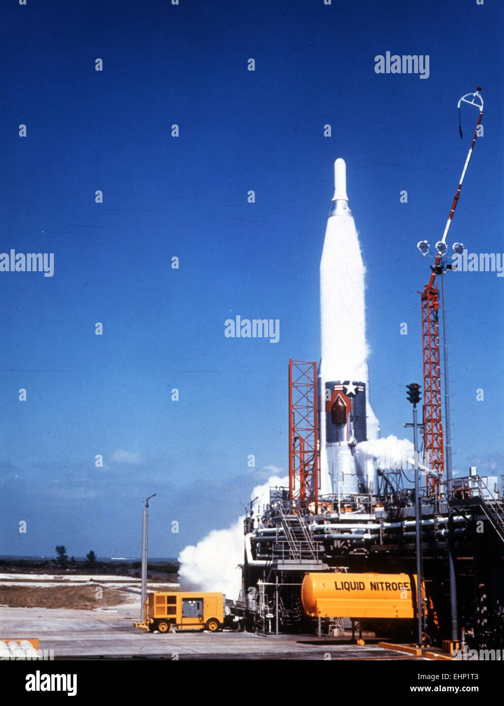 The liftoff of an Atlas 14F missile on October 18, 1962, is captured ...