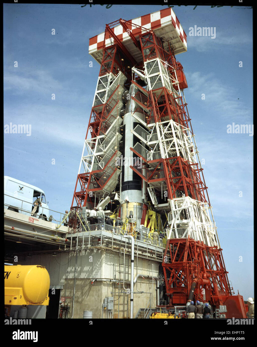 A photograph of the Atlas 15A missile on its launch pad, with the ...