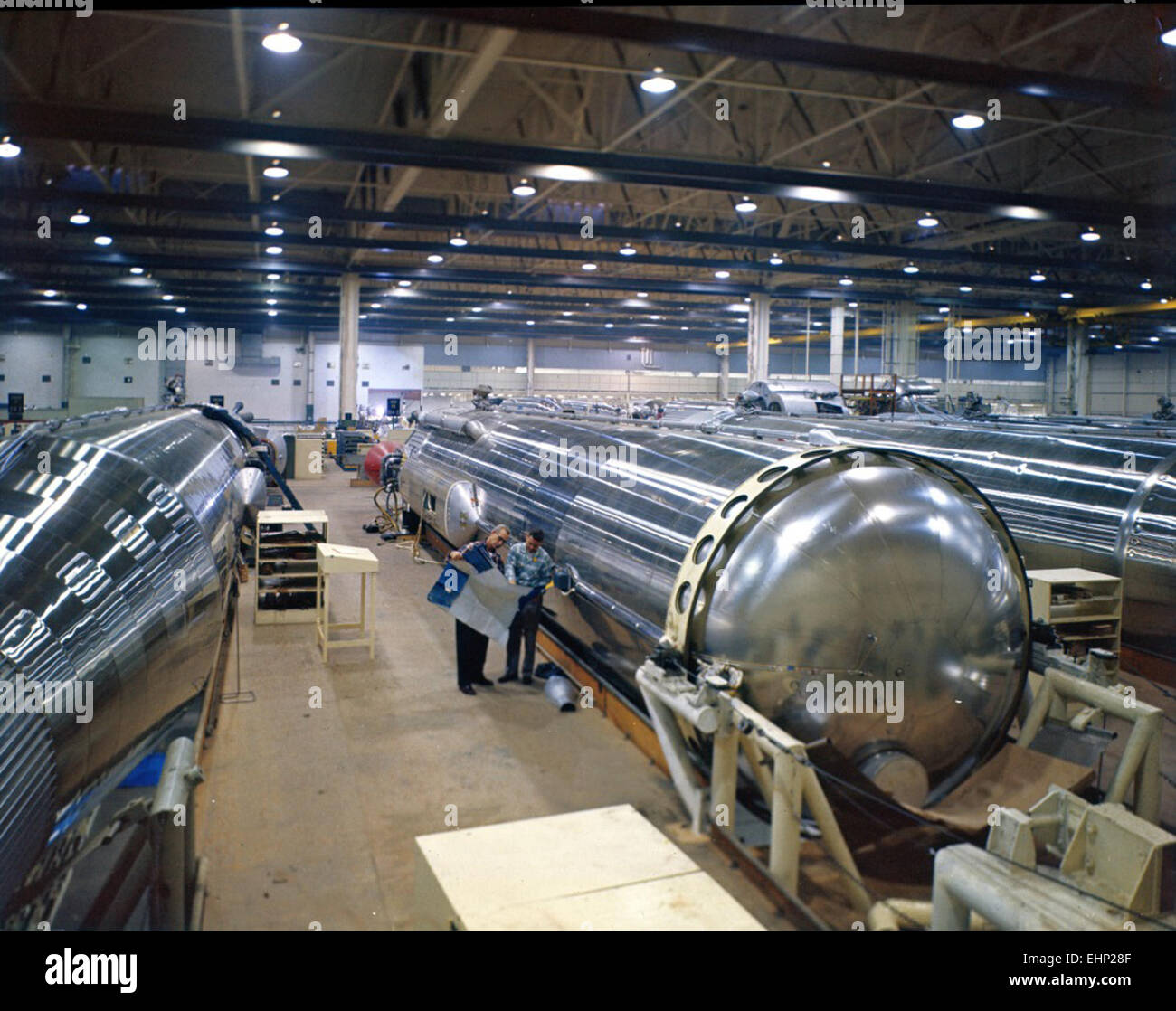 An image depicting the manufacturing process of the Atlas missile, an ...