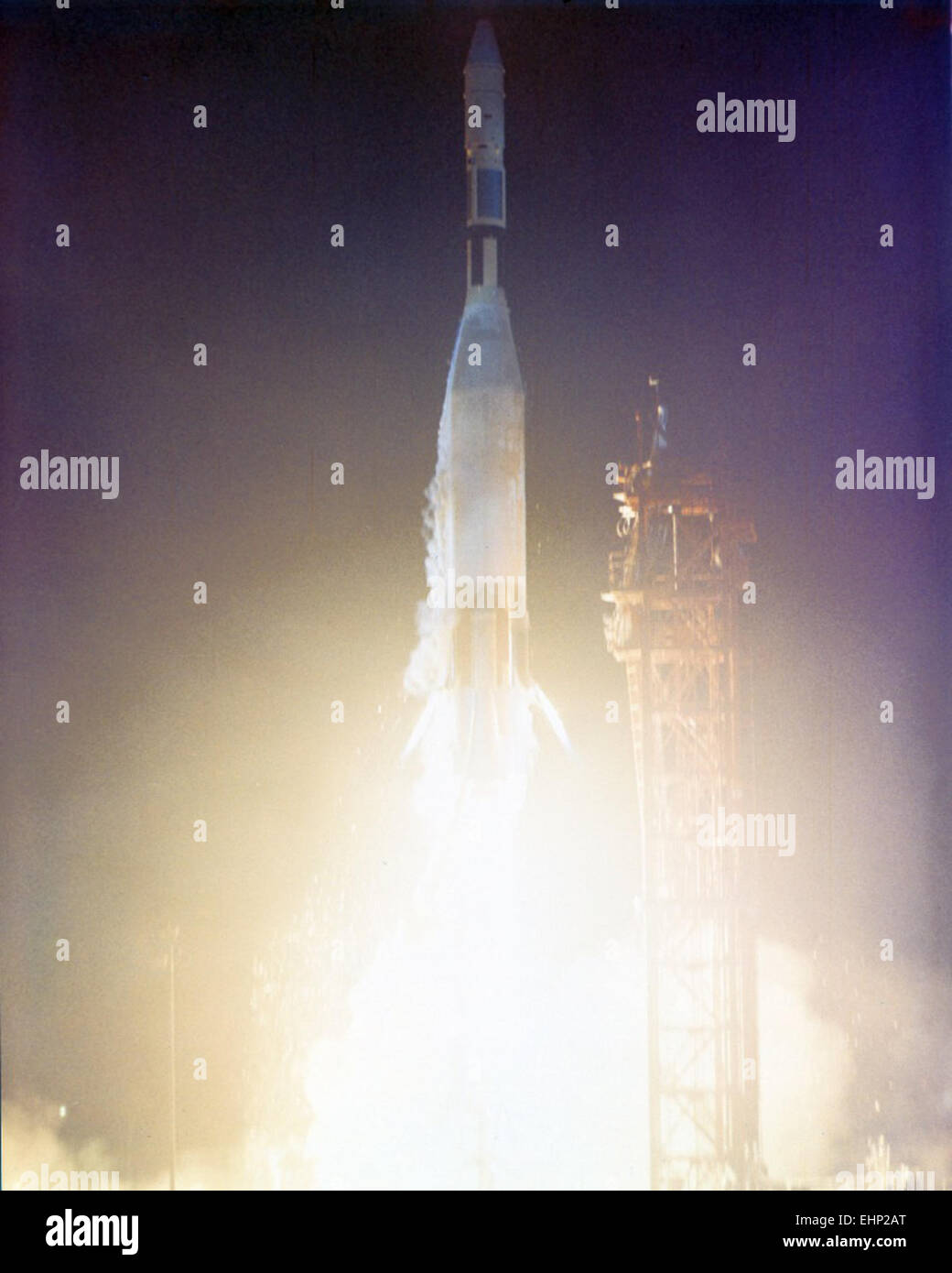 A photograph of the Atlas-Agena launch vehicle lifting off, carrying a ...