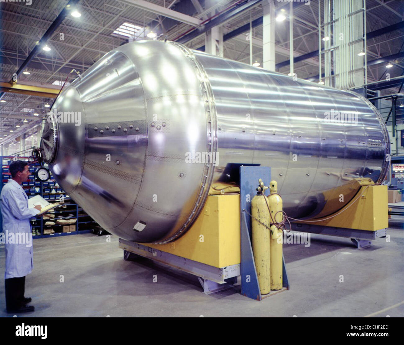 A photograph showing the assembly process of a Centaur tank section ...