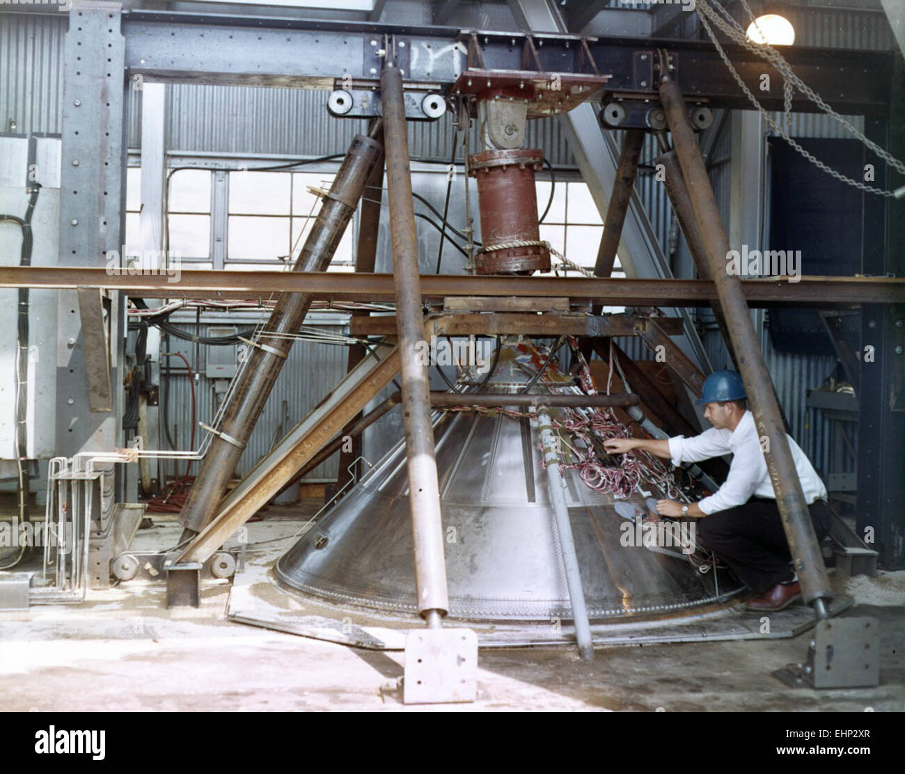 A photograph from the Pt. Loma test site showing a fuel tank nose cone ...