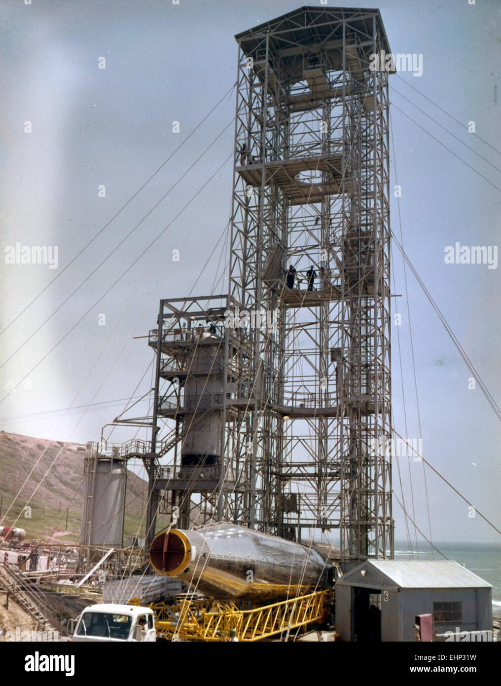 A photograph from May 21, 1959, documenting the erection of a missile ...