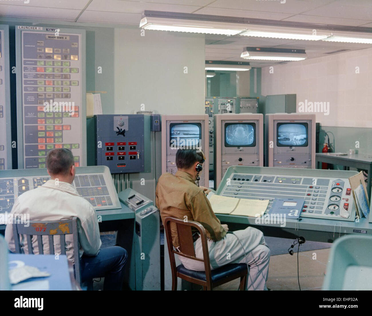 A photograph of a missile training session, showing a blockhouse used ...