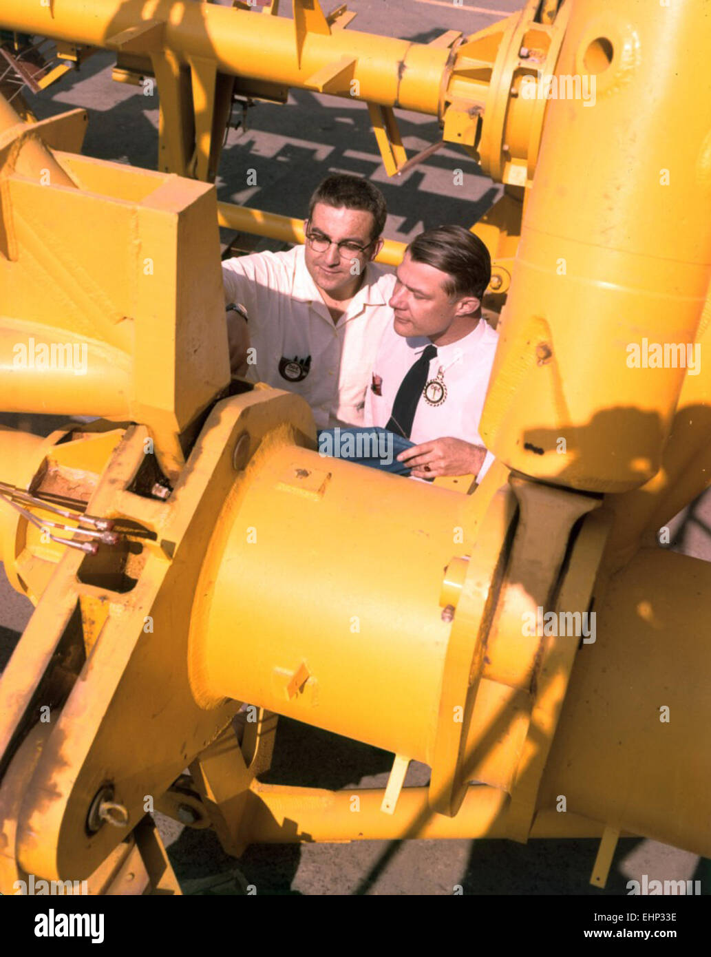 A photograph from November 24, 1958, showing an engineer working with a ...
