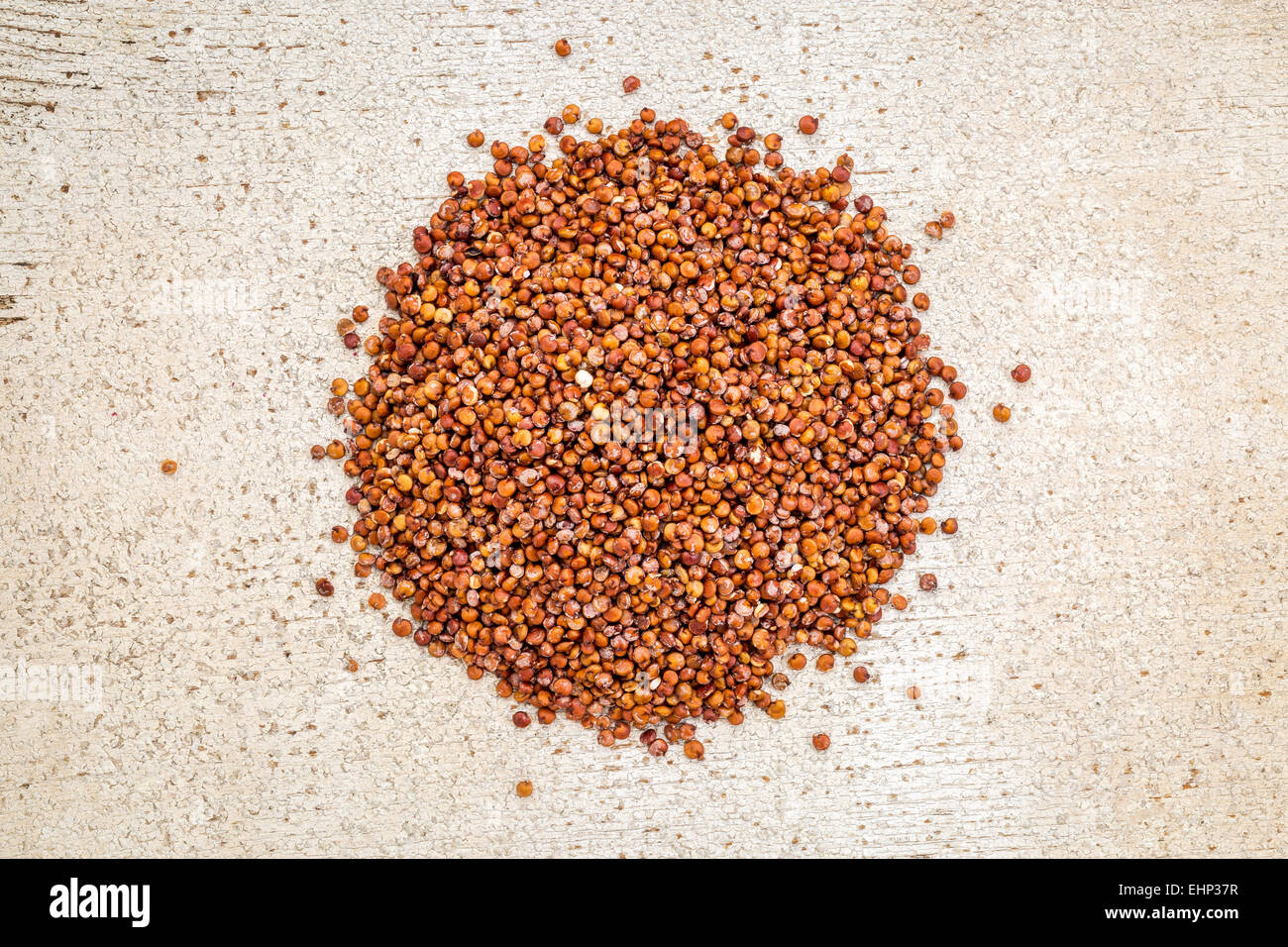 gluten free red quinoa grain - top view against rustic white painted ...