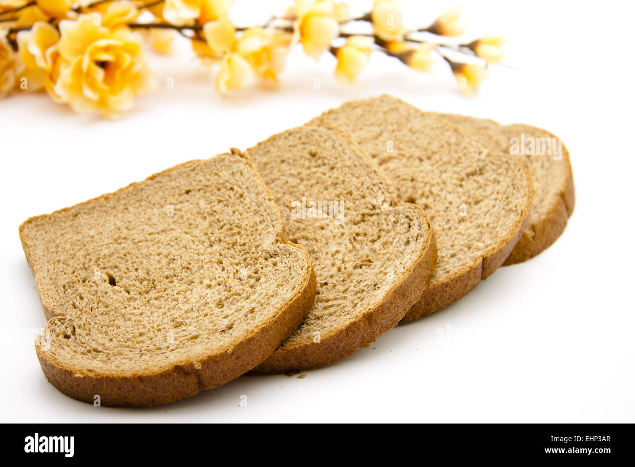 Wholemeal toast bread with blossoms Stock Photo - Alamy