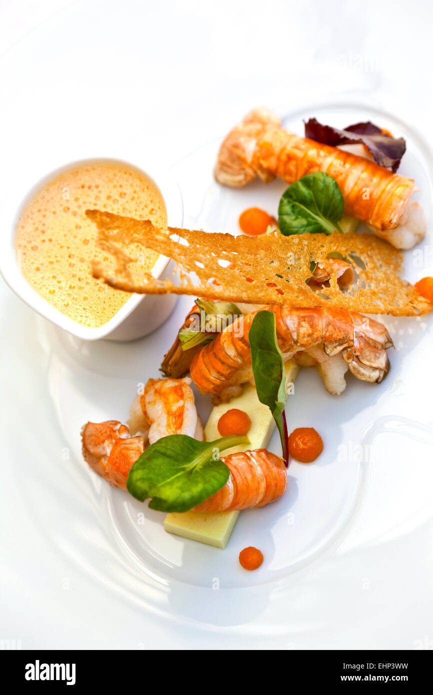 Prawns, zucchini mousse, toast and grilled shellfish sauce Stock Photo ...