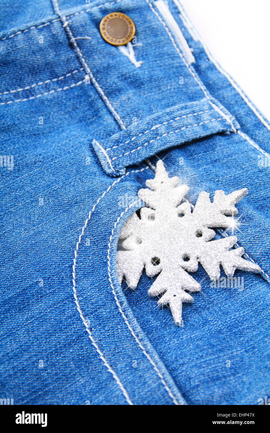 Snowflake in a pocket of blue jeans Stock Photo - Alamy