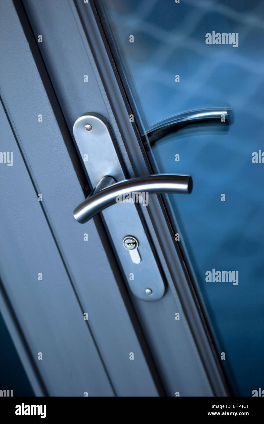 Close up of an aluminum door handle Stock Photo - Alamy