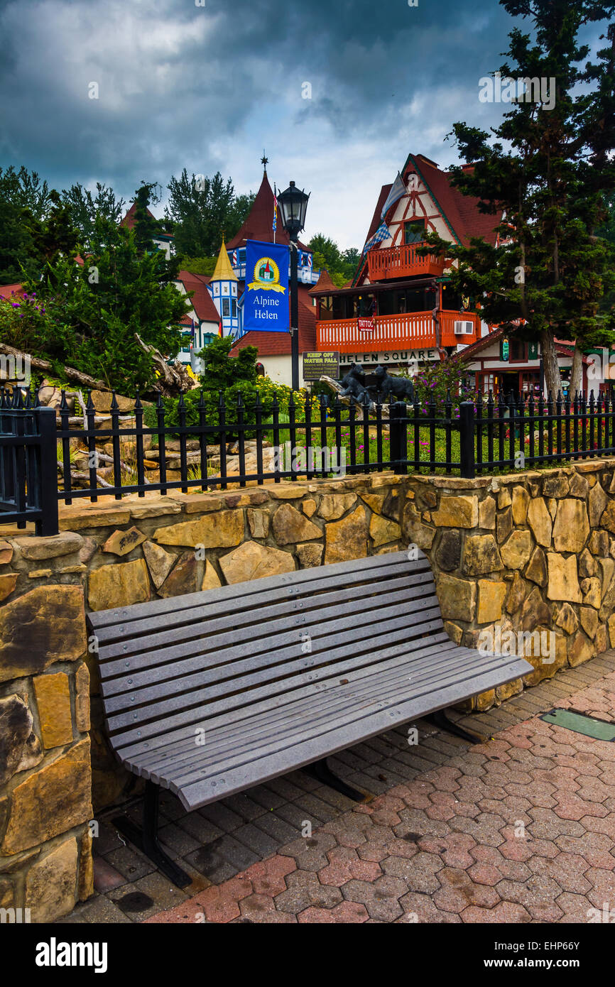 Bench and red-roofed buildings in Helen, Georgia Stock Photo - Alamy