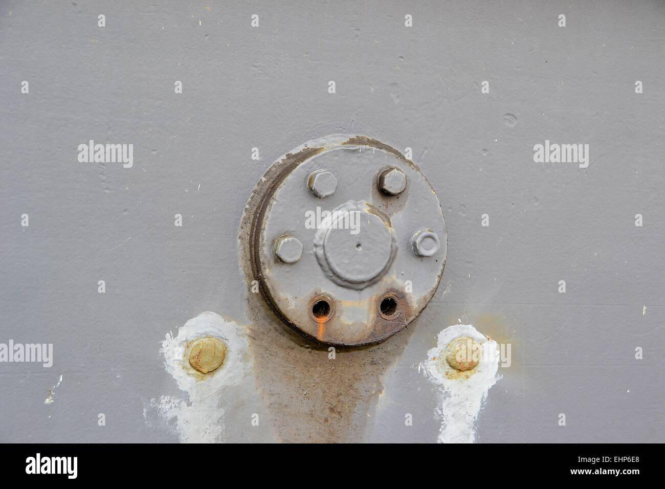 Flange with two screws missing Stock Photo - Alamy