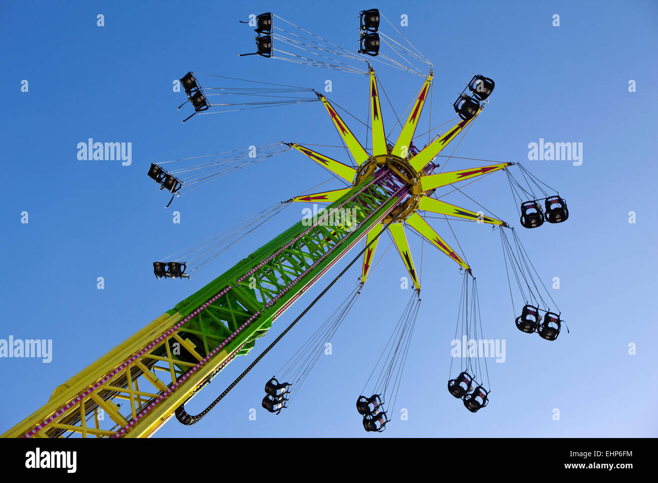 Very high ride in a luna-park Stock Photo - Alamy